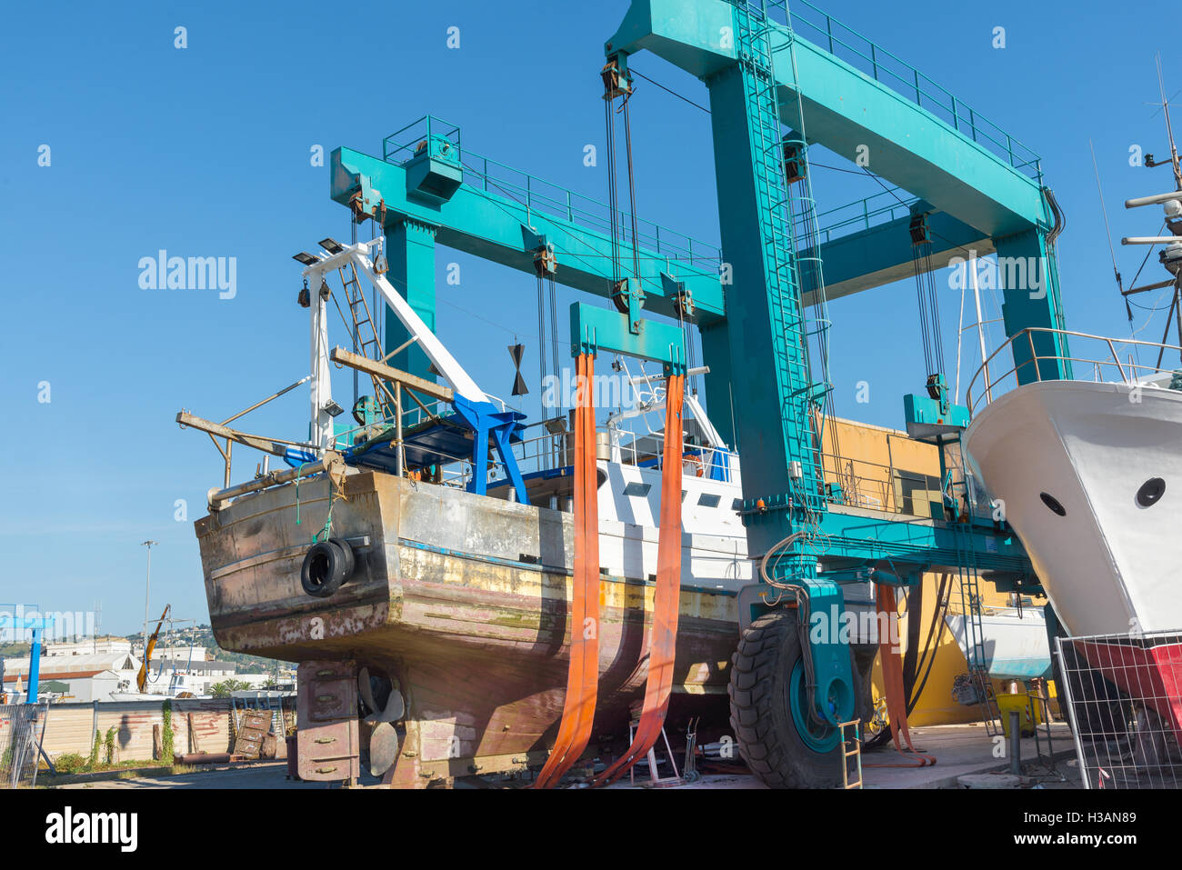 Ship repair in shipyard Stock Photo - Alamy