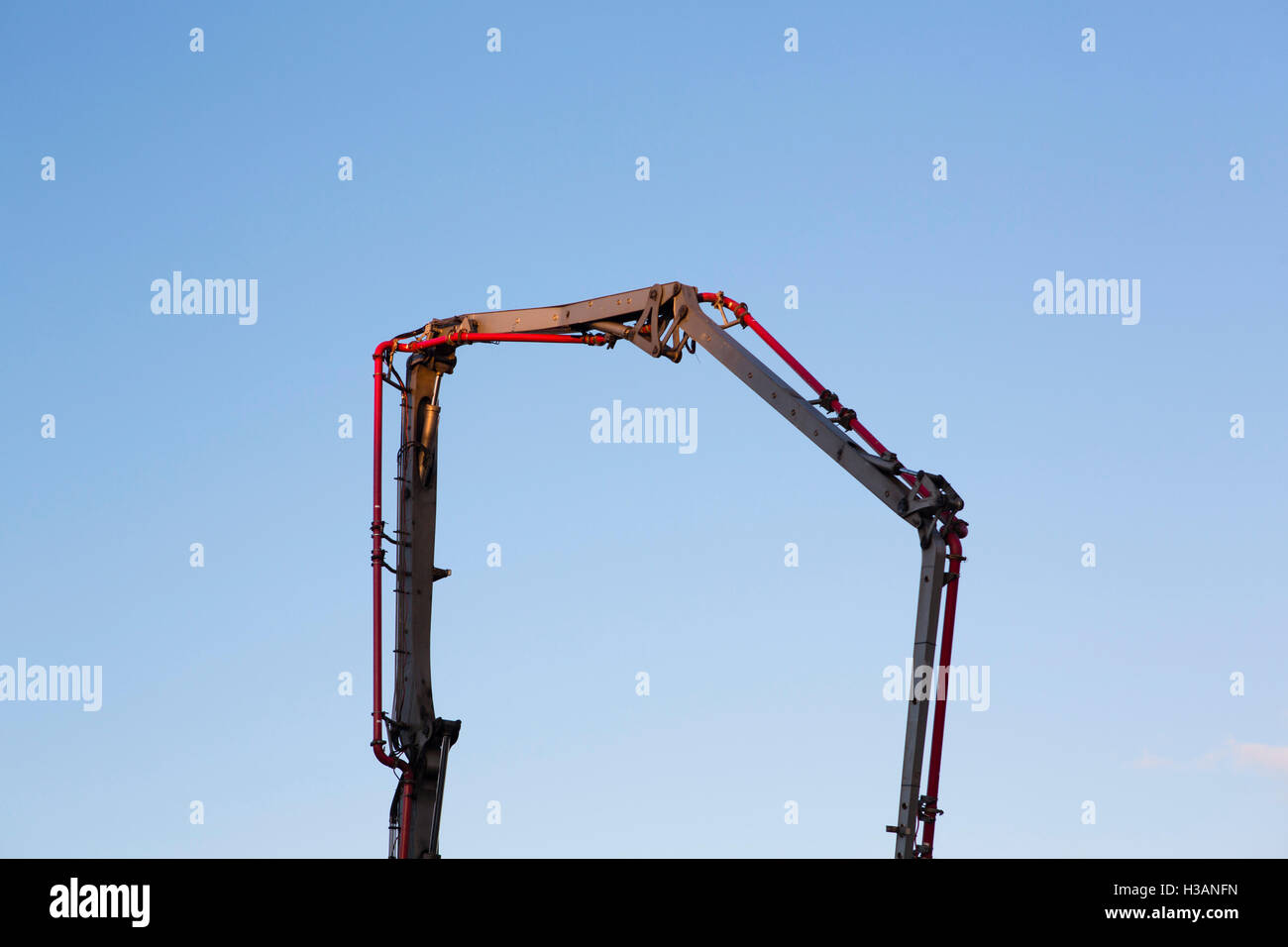 Arm of a large construction site cement pumping machine Stock Photo - Alamy
