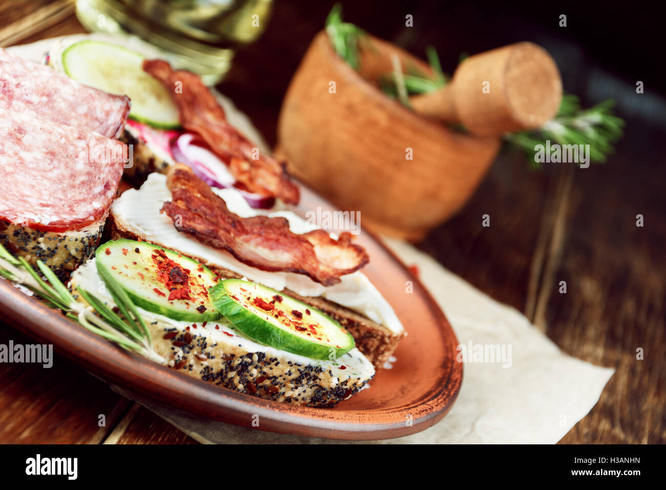 Tasty homemade tapas with different fillings on the table Stock Photo ...