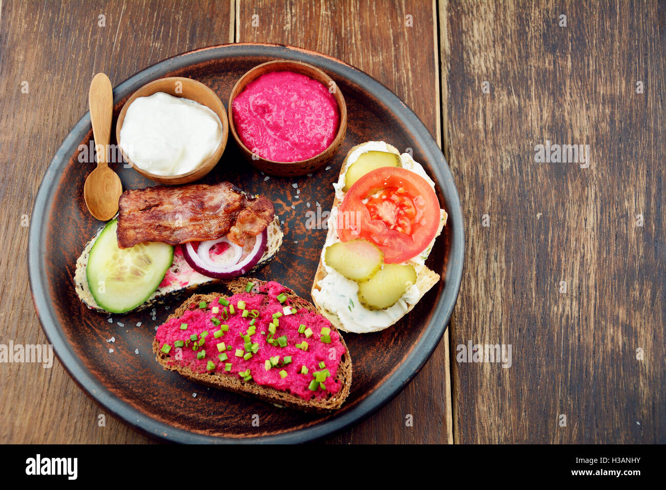 Tasty homemade tapas with different fillings on the table Stock Photo ...
