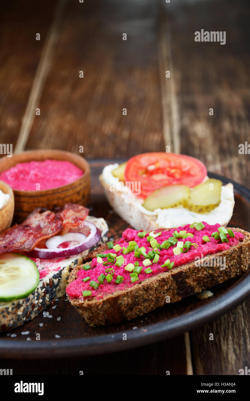 Tasty homemade tapas with different fillings on the table Stock Photo ...