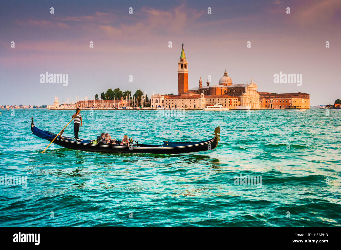 Beautiful View Of Traditional Gondola On Canal Grande With San Giorgio