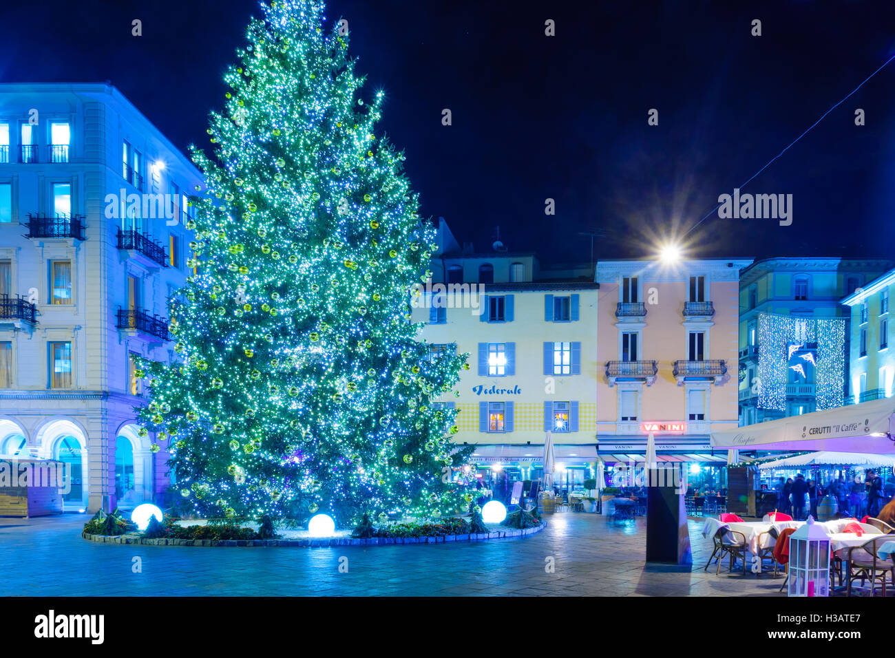 LUGANO, SWITZERLAND - DECEMBER 29, 2015: Evening scene in Piazza della ...