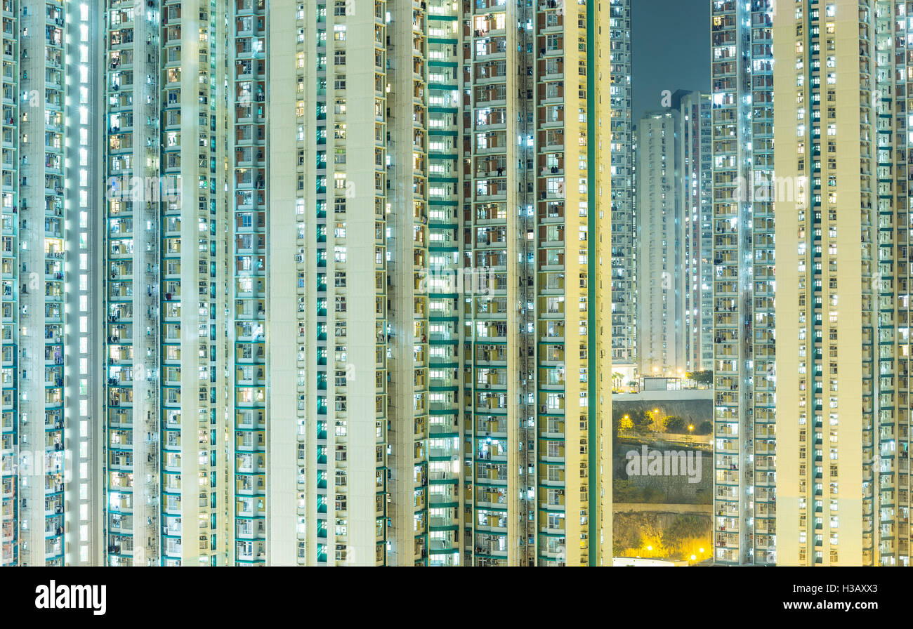 Packed building at night Stock Photo - Alamy