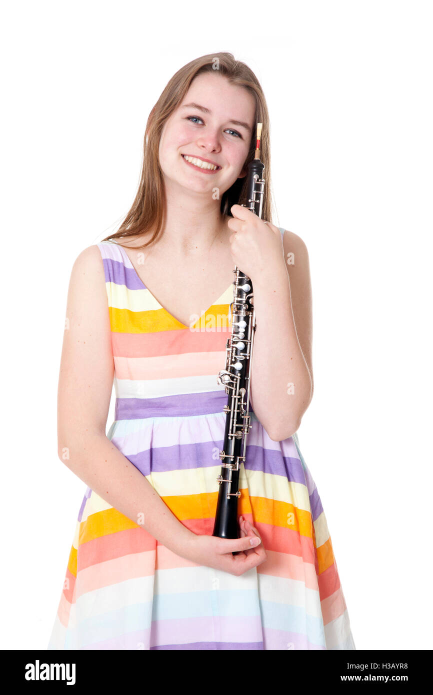 smiling girl in colorful dress with oboe Stock Photo - Alamy