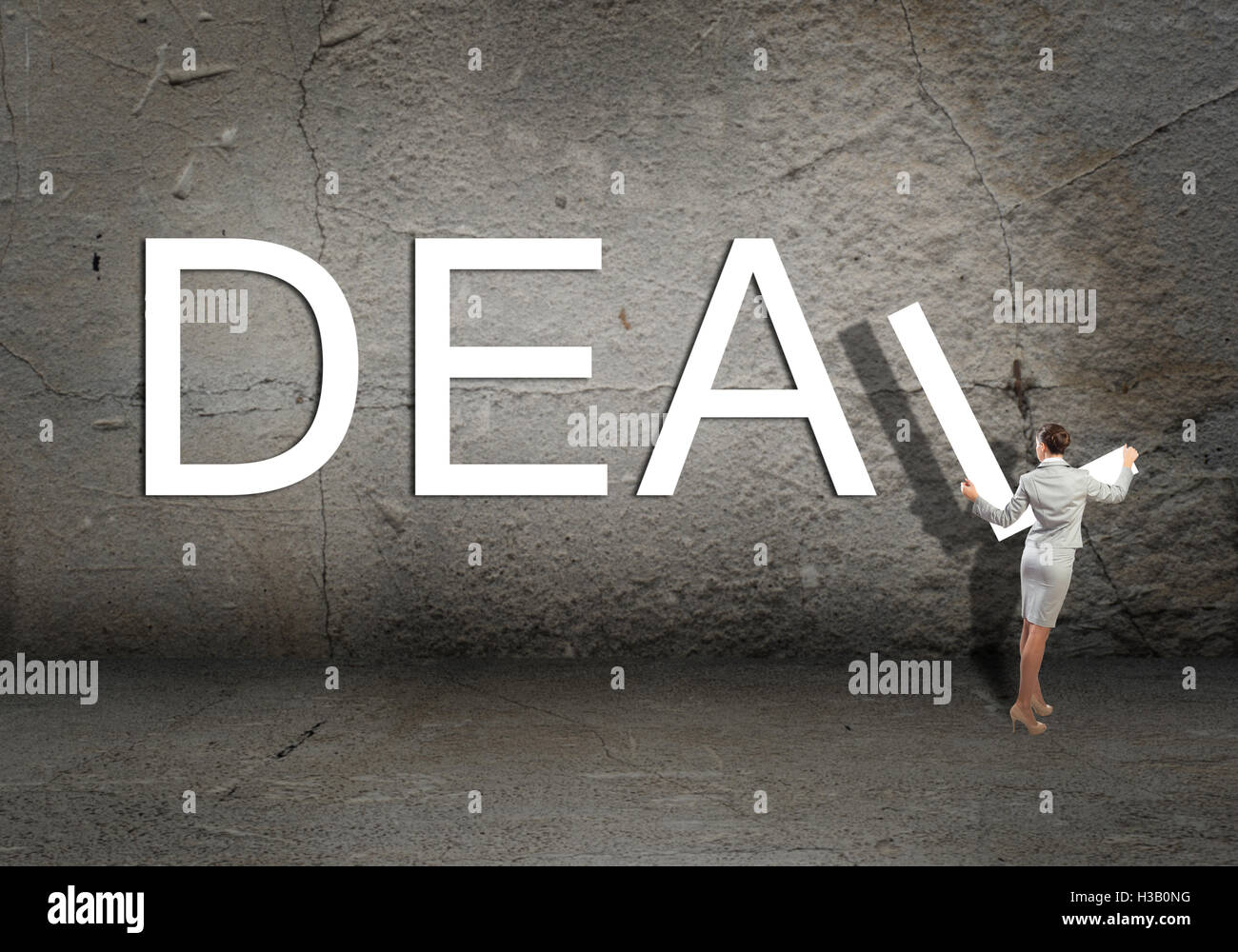 young businesswoman adds deal word Stock Photo - Alamy