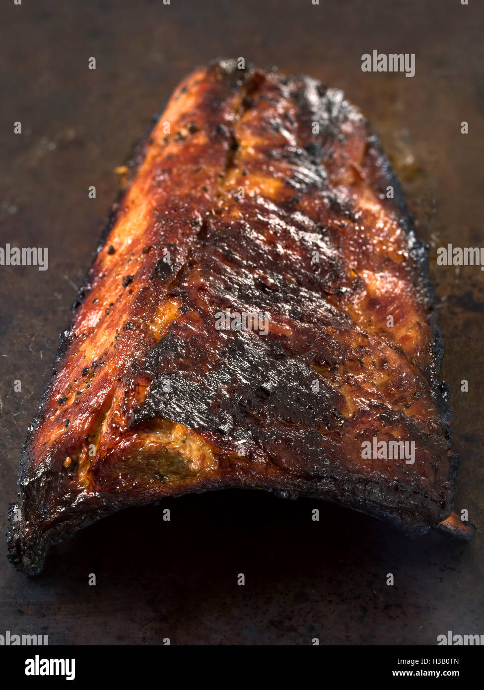 rack of rustic baked pork rib Stock Photo - Alamy