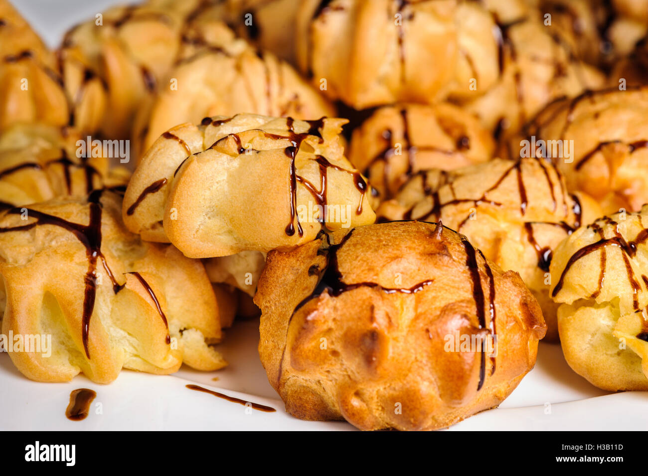 plate of profiteroles Stock Photo - Alamy