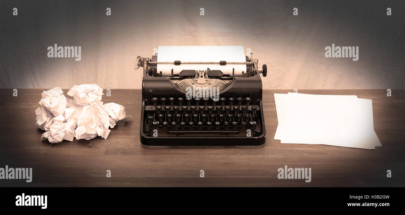 Vintage typewriter and old books Stock Photo - Alamy