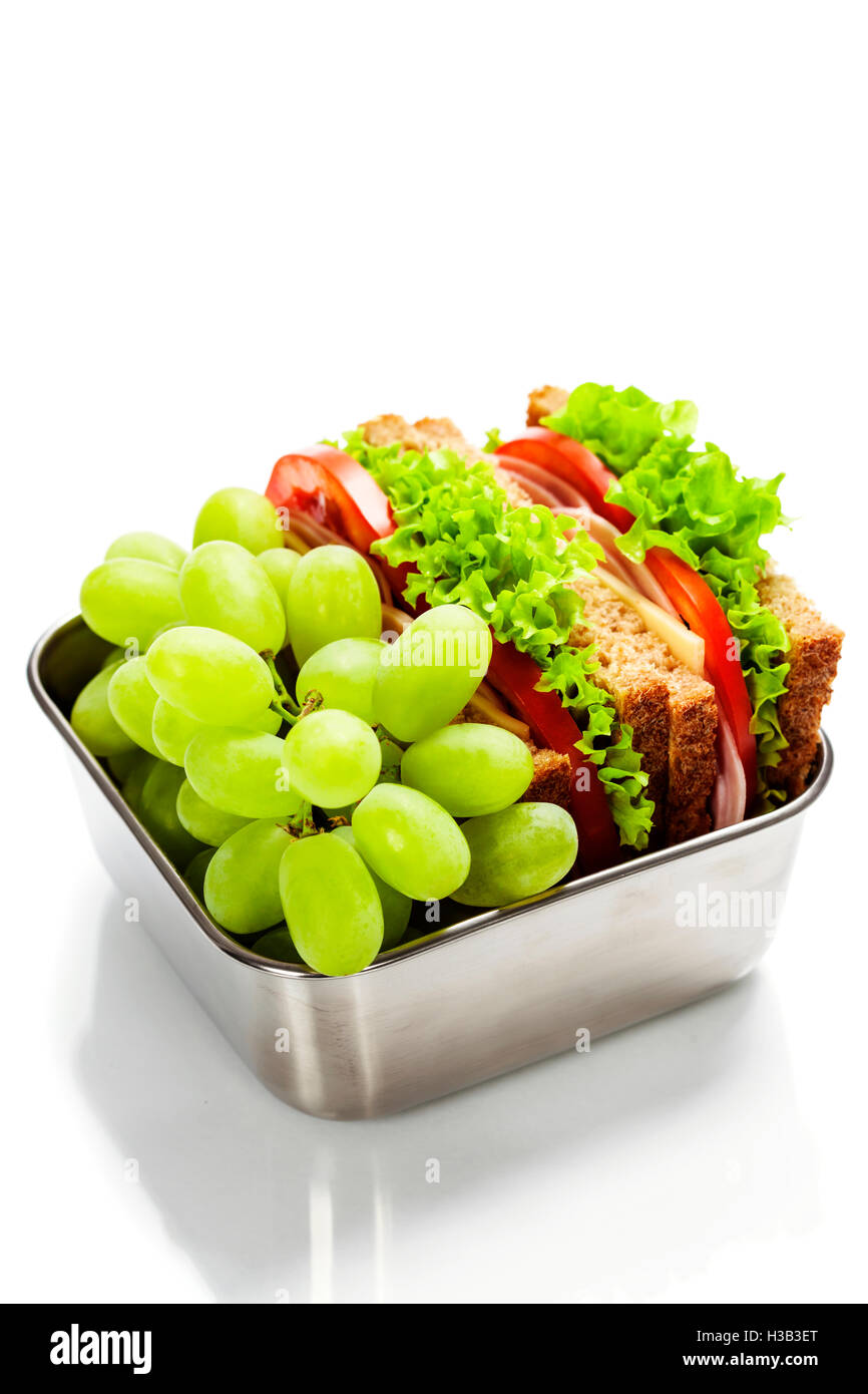Lunch box with sandwich and grapes Stock Photo - Alamy
