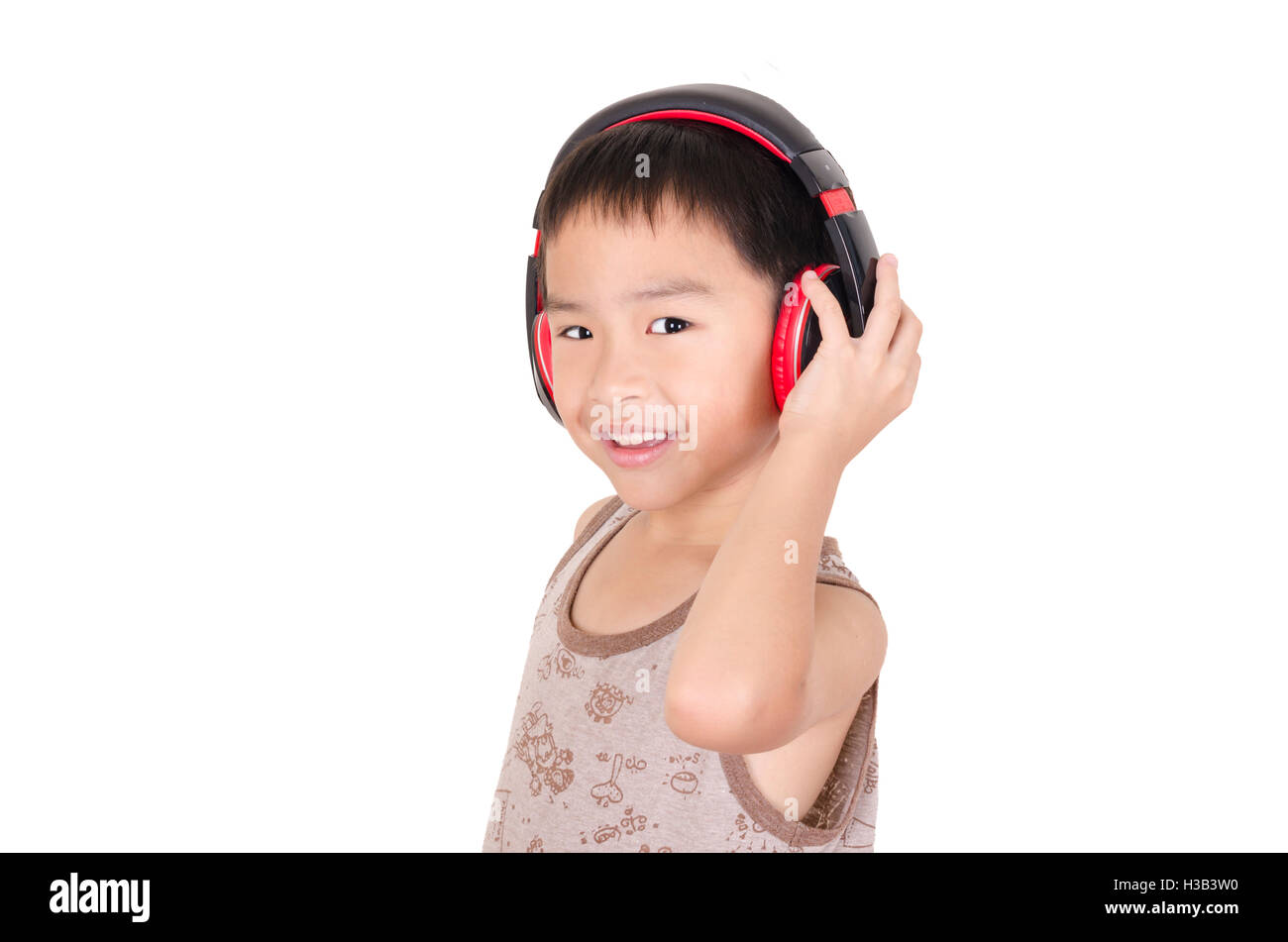 Cute children listen to music Stock Photo - Alamy