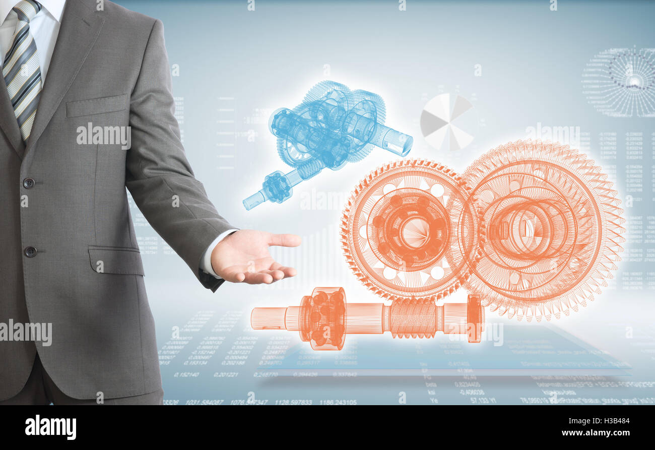 Businessman points hand on wire frame gears Stock Photo - Alamy