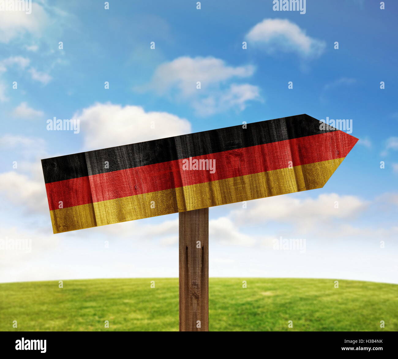 Germany wooden direction sign on nature background Stock Photo - Alamy