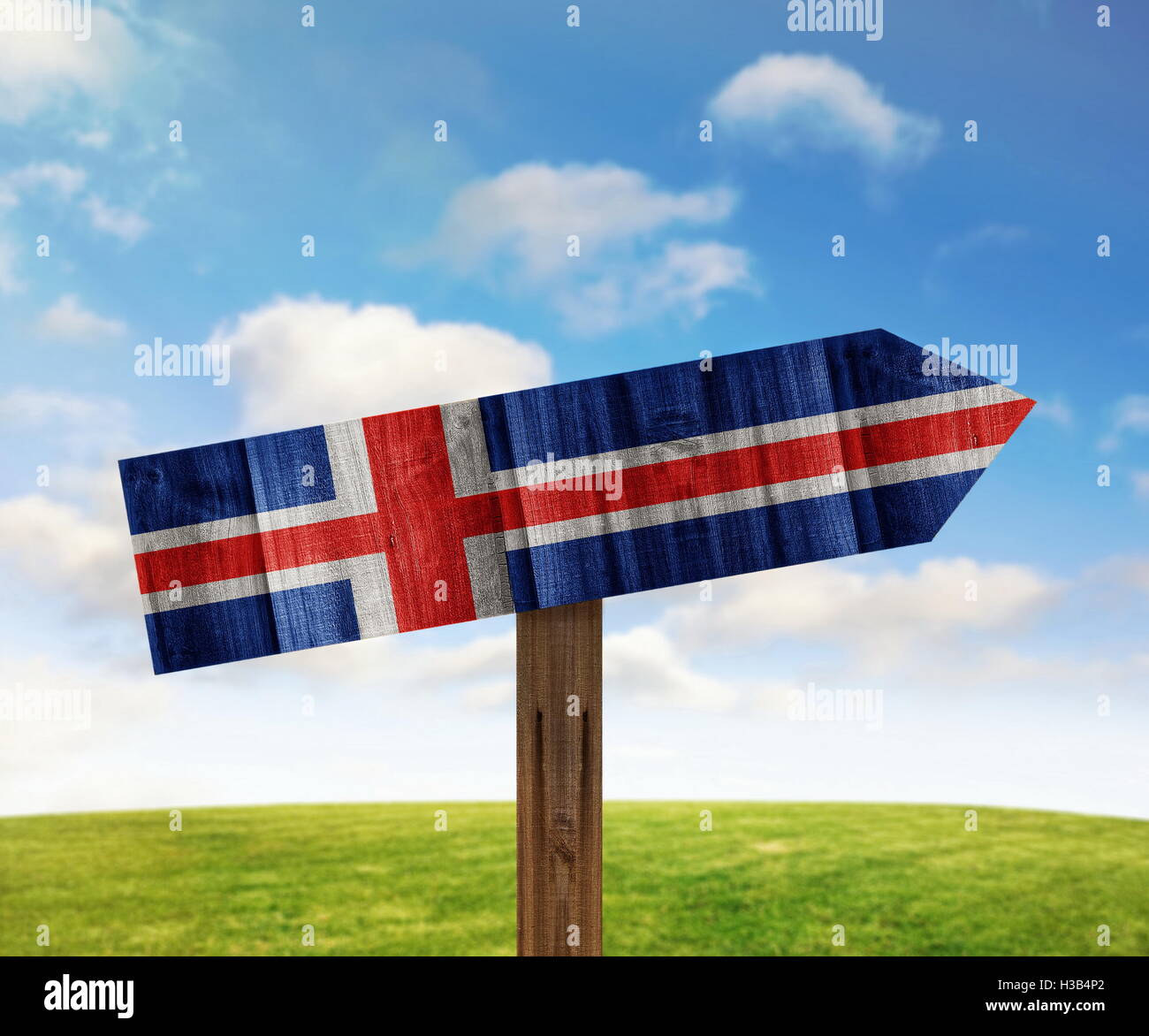 Iceland wooden direction sign on nature background Stock Photo - Alamy
