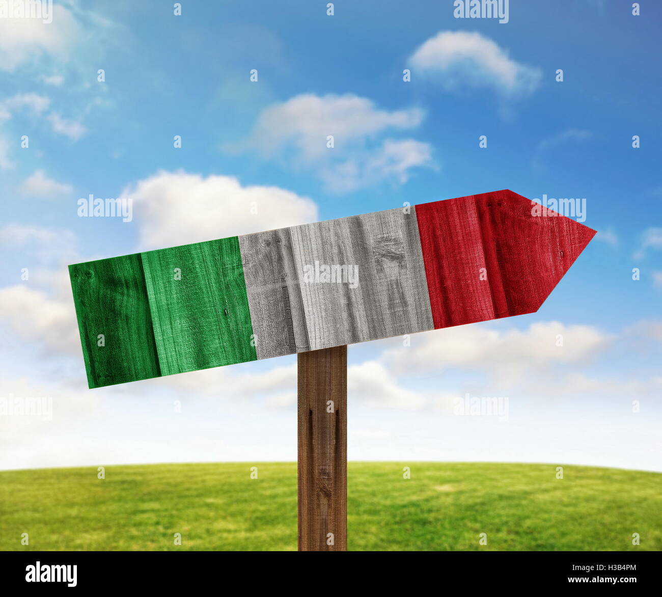 Italy wooden direction sign on nature background Stock Photo - Alamy