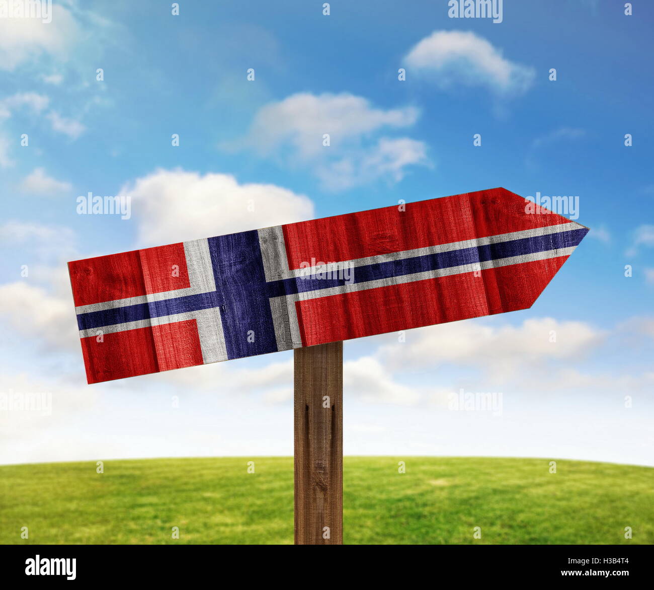 Norway wooden direction sign on nature background Stock Photo - Alamy