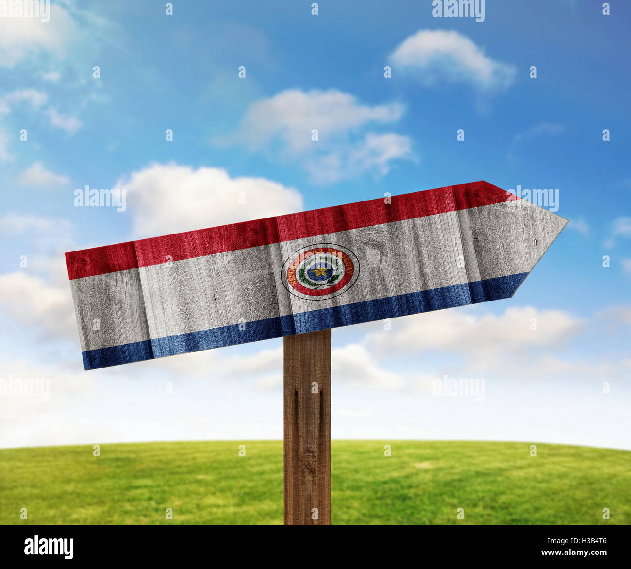 Paraguay wooden direction sign on nature background Stock Photo - Alamy