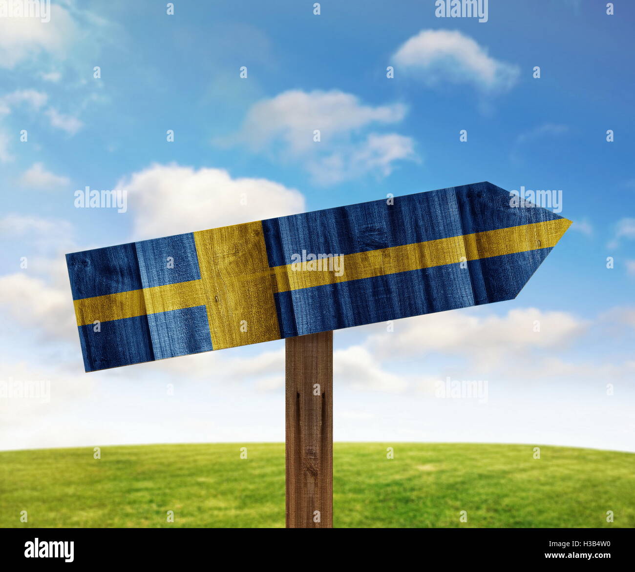 Sweden wooden direction sign on nature background Stock Photo - Alamy