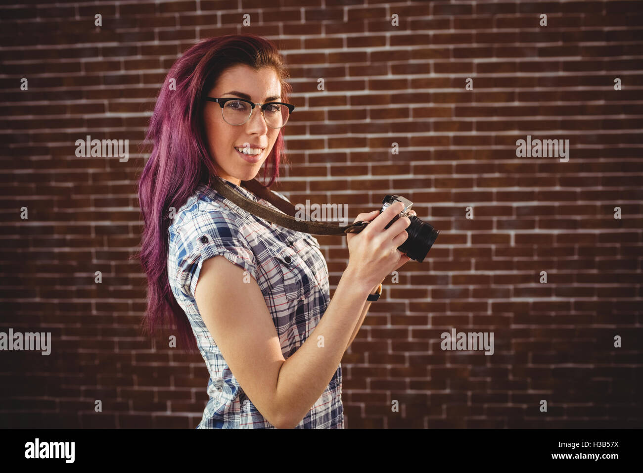 Beautiful woman looking camera using hi-res stock photography and ...