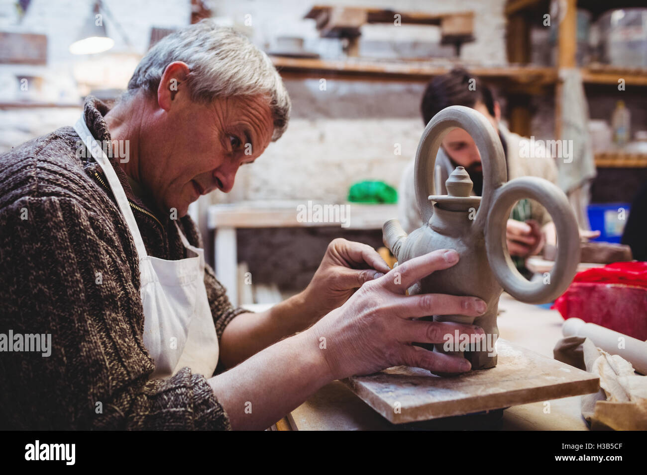 Mature male artist making hi-res stock photography and images - Alamy