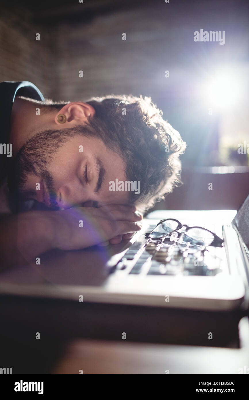 Man sleeping café table hi-res stock photography and images - Alamy