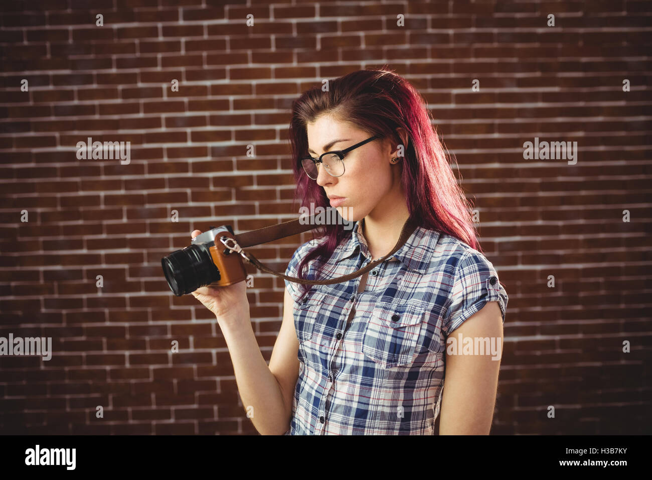 Checking the camera hi-res stock photography and images - Alamy