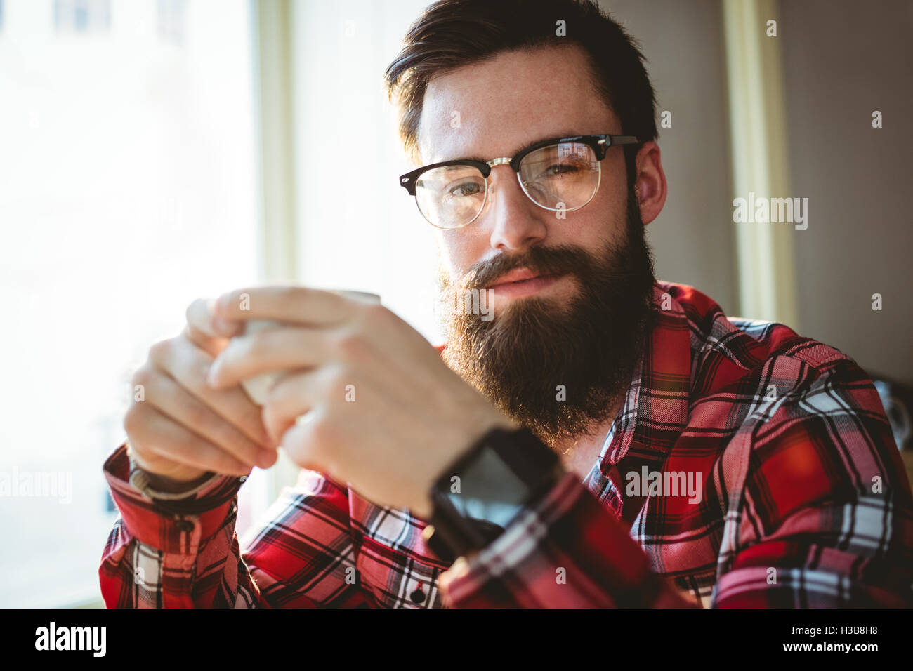 Portrait of confident customer with eyeglasses at cafe Stock Photo - Alamy
