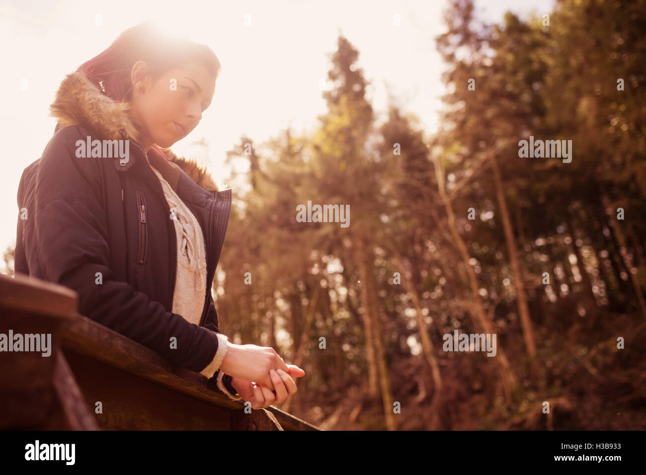 woman standing and looking something Stock Photo - Alamy