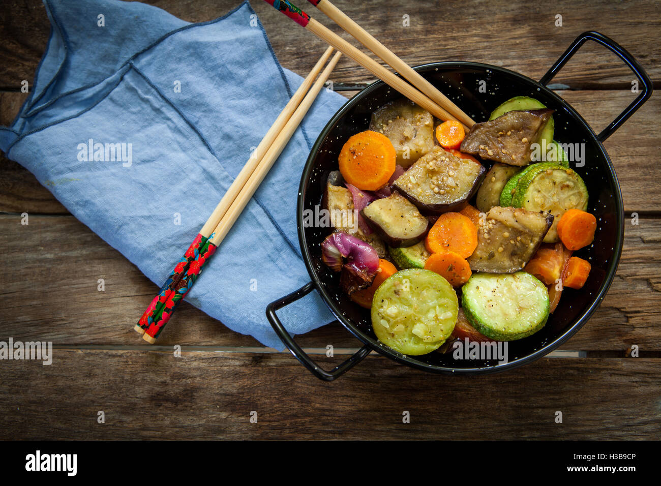 roasted vegetables on pot with chinese chopstick Stock Photo - Alamy