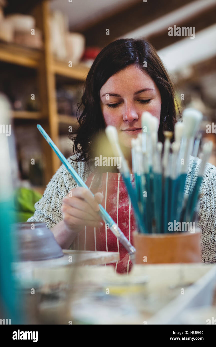 Female potter working Stock Photo - Alamy