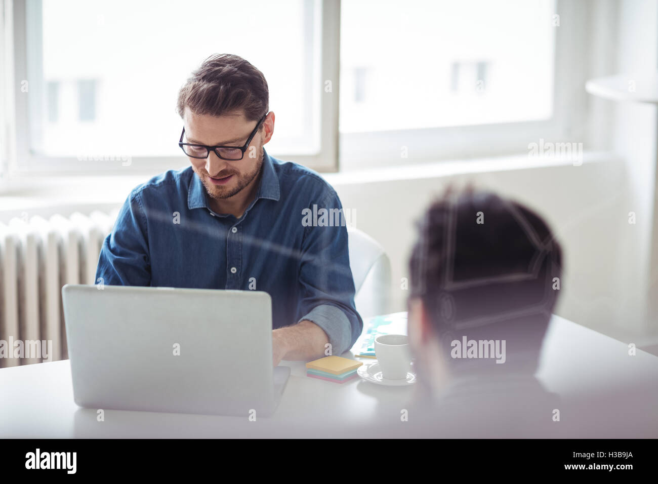 Coworker desk hi-res stock photography and images - Alamy