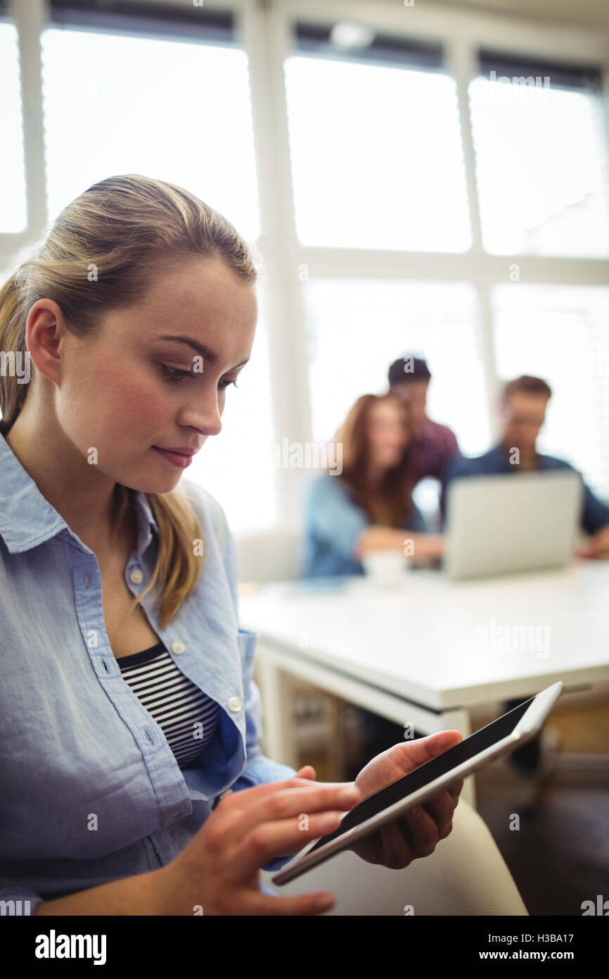 Serious designer using tablet hi-res stock photography and images - Alamy