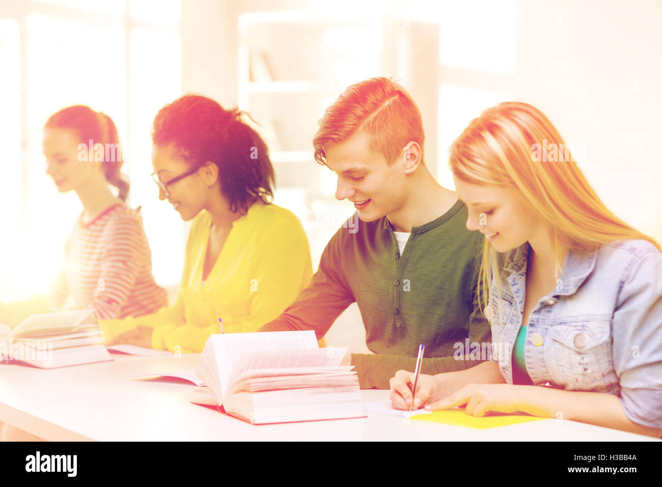 students with textbooks and books at school Stock Photo - Alamy