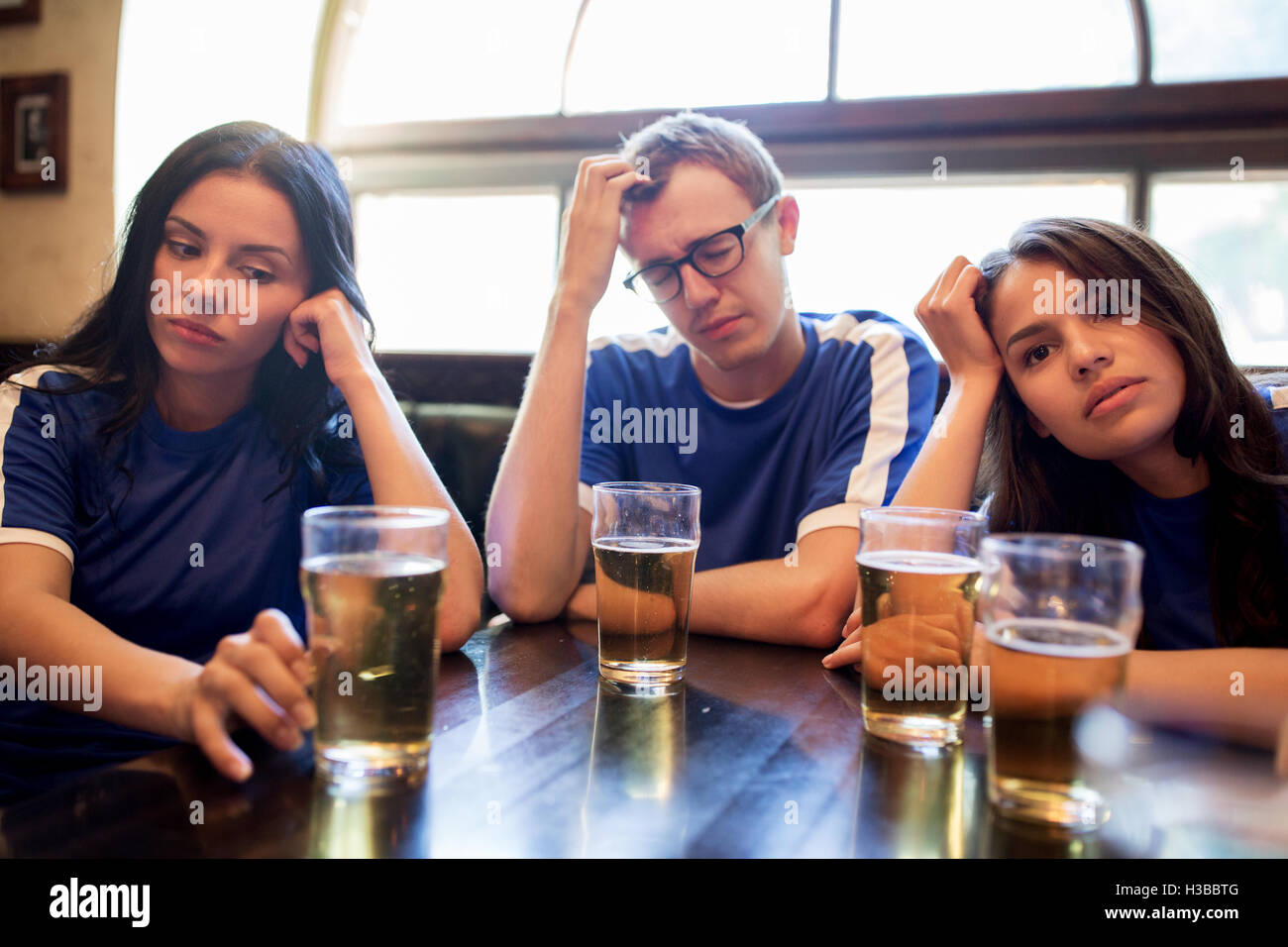 Soccer fans at pub hi-res stock photography and images - Alamy