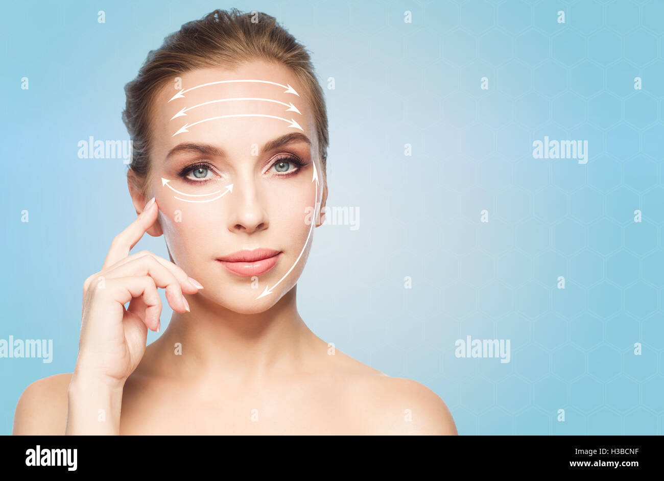 beautiful young woman showing her cheekbone Stock Photo - Alamy