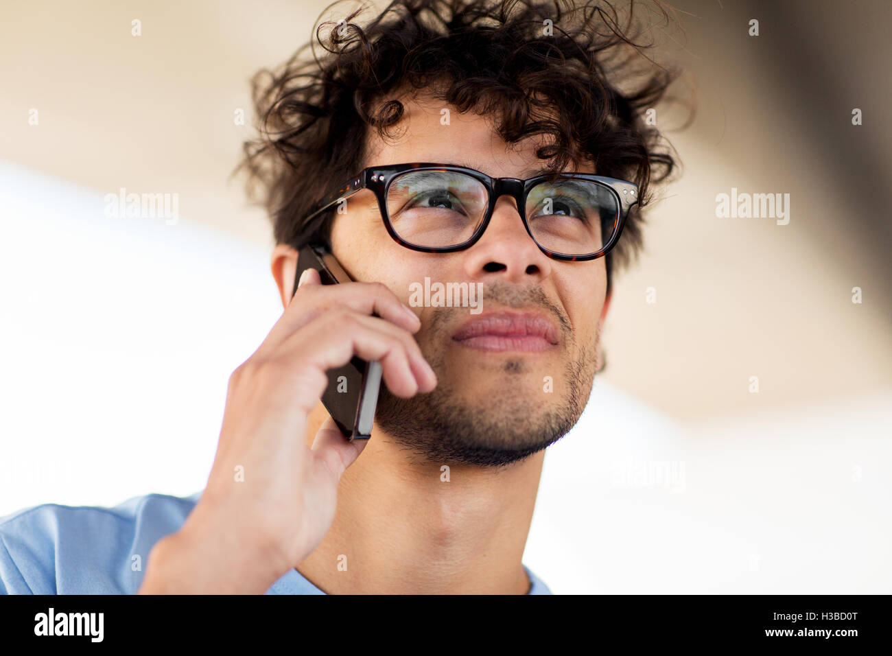 man with smartphone calling on city street Stock Photo - Alamy