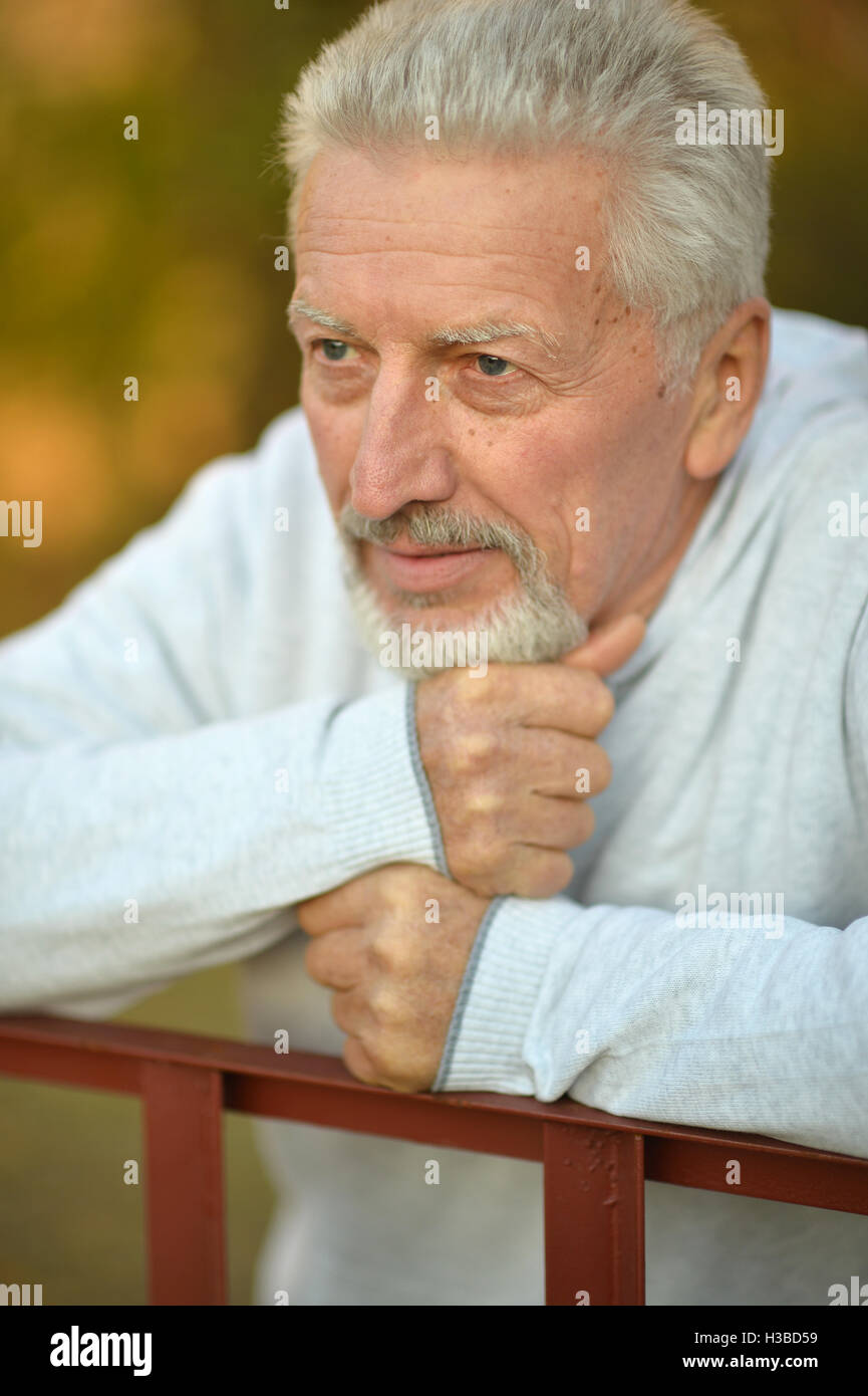 Senior man thinking Stock Photo - Alamy