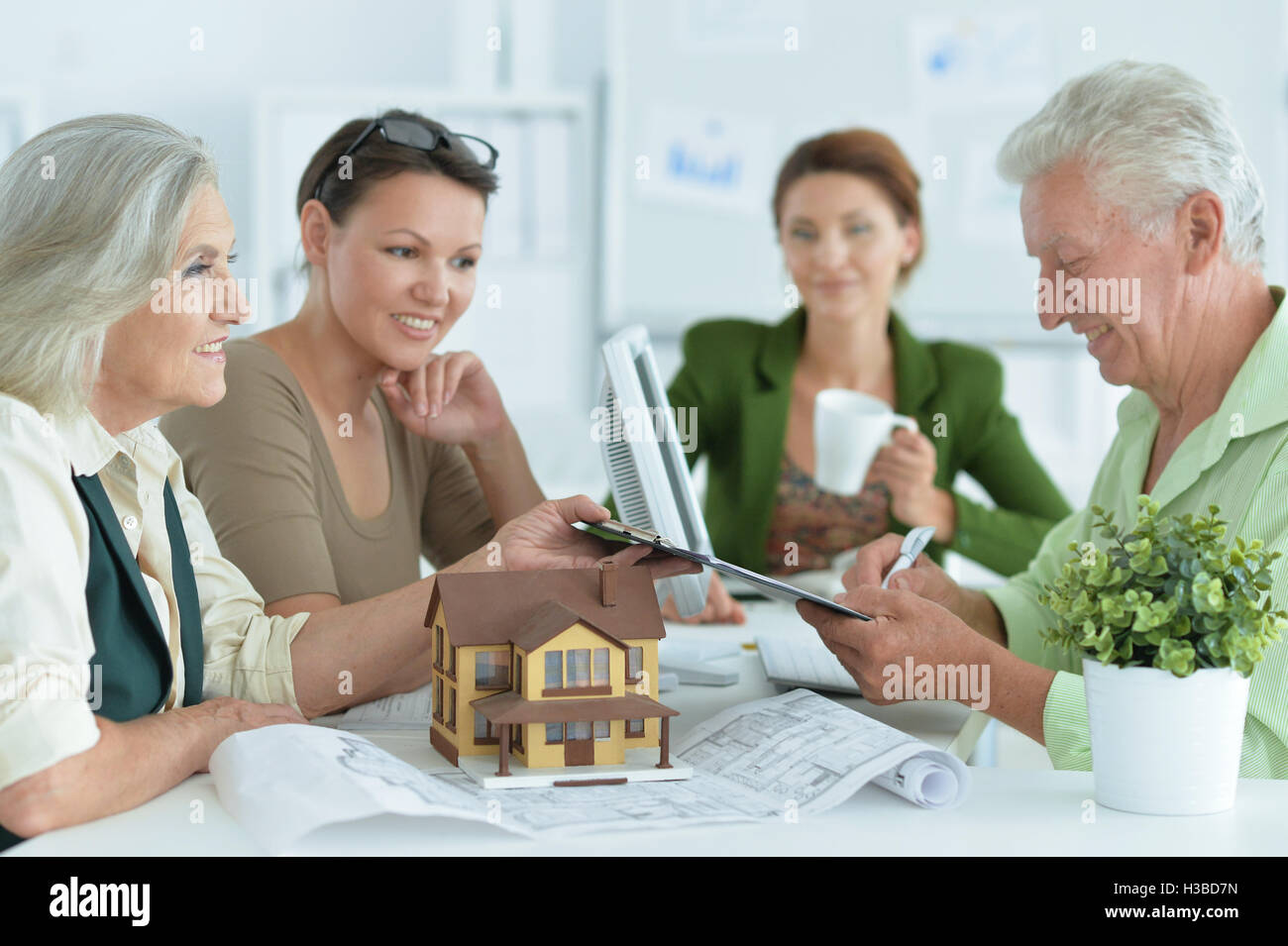 Portrait Of working house agent Stock Photo - Alamy