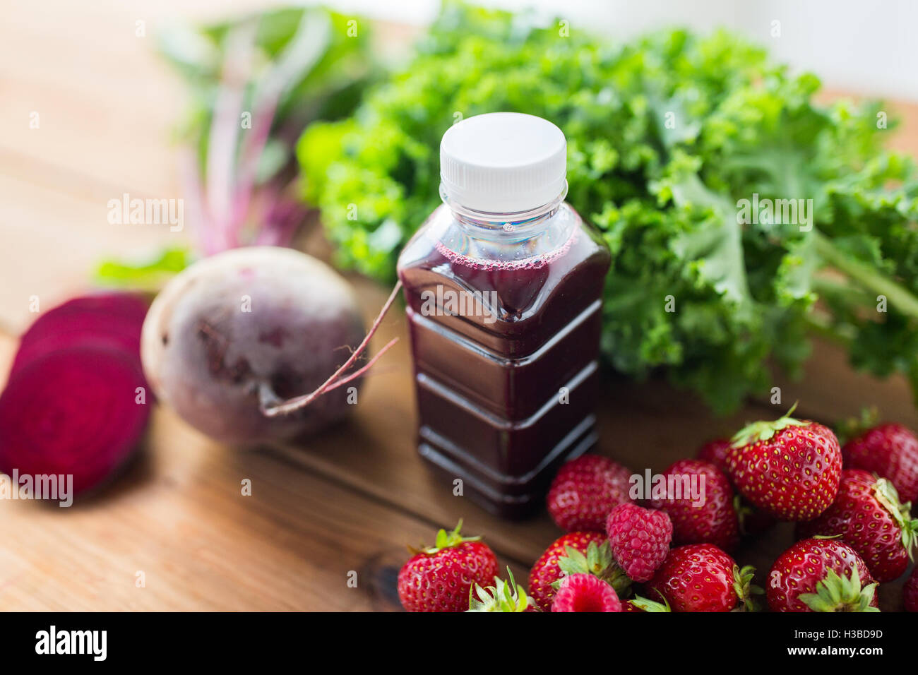 bottle with beetroot juice, fruits and vegetables Stock Photo - Alamy
