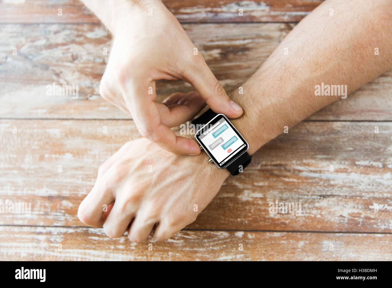 close up of hands with messenger on smart watch Stock Photo - Alamy
