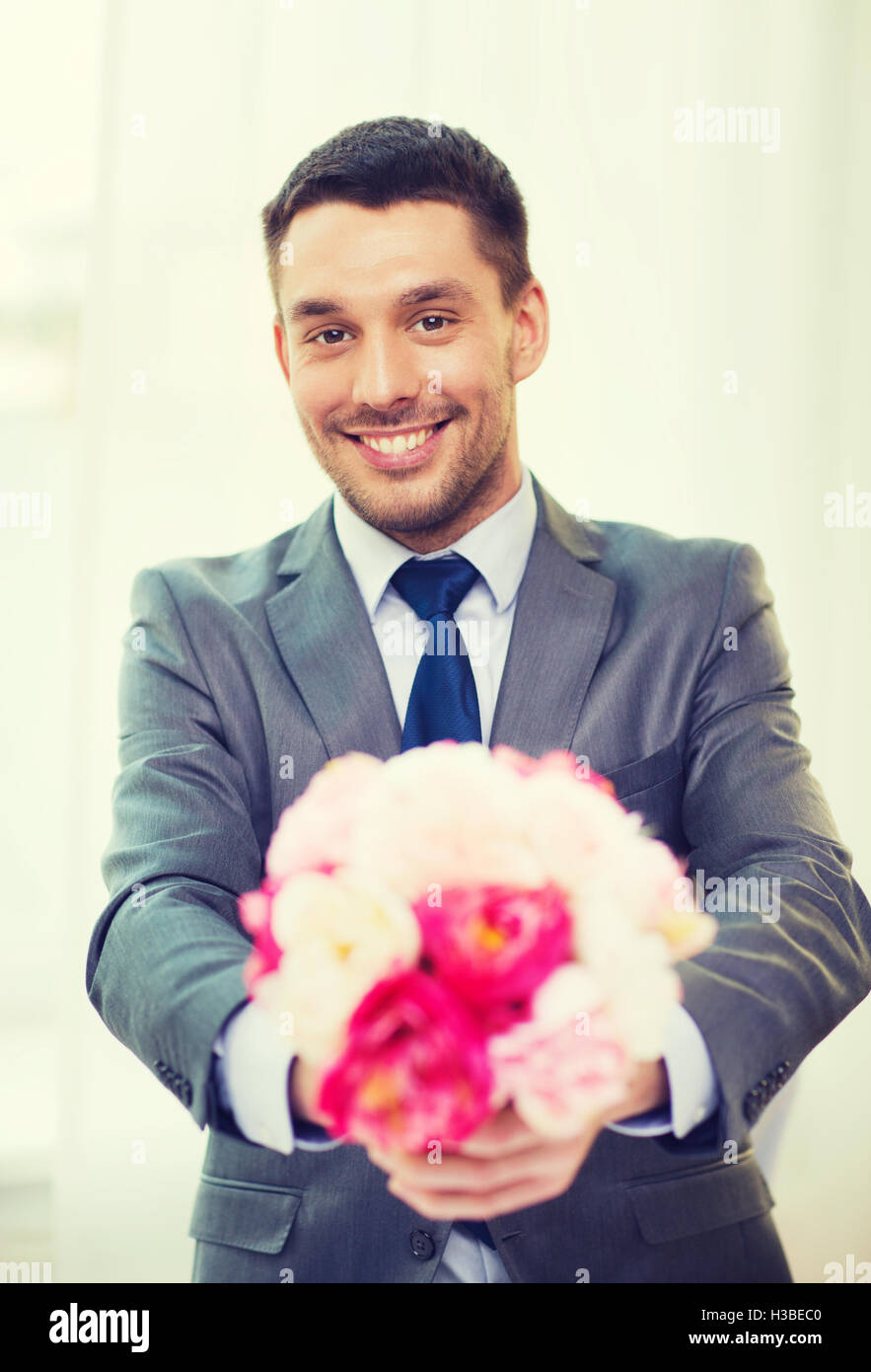 Giving holding present hi-res stock photography and images - Alamy