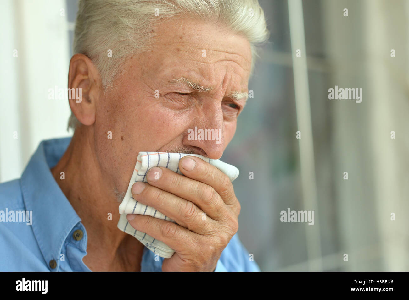 Sick elderly man Stock Photo - Alamy