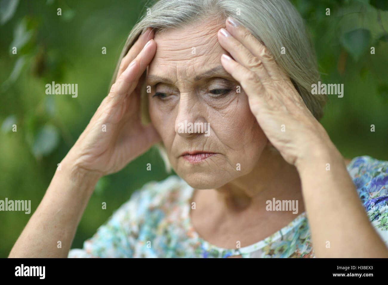 Nice sad old woman Stock Photo - Alamy