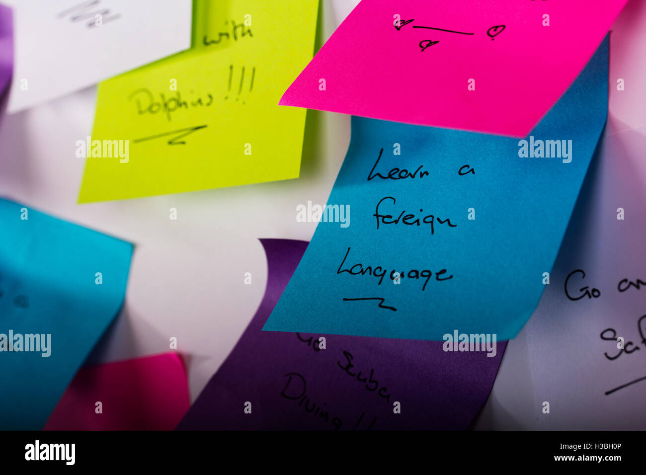Colourful sticky notes with things to do Stock Photo - Alamy
