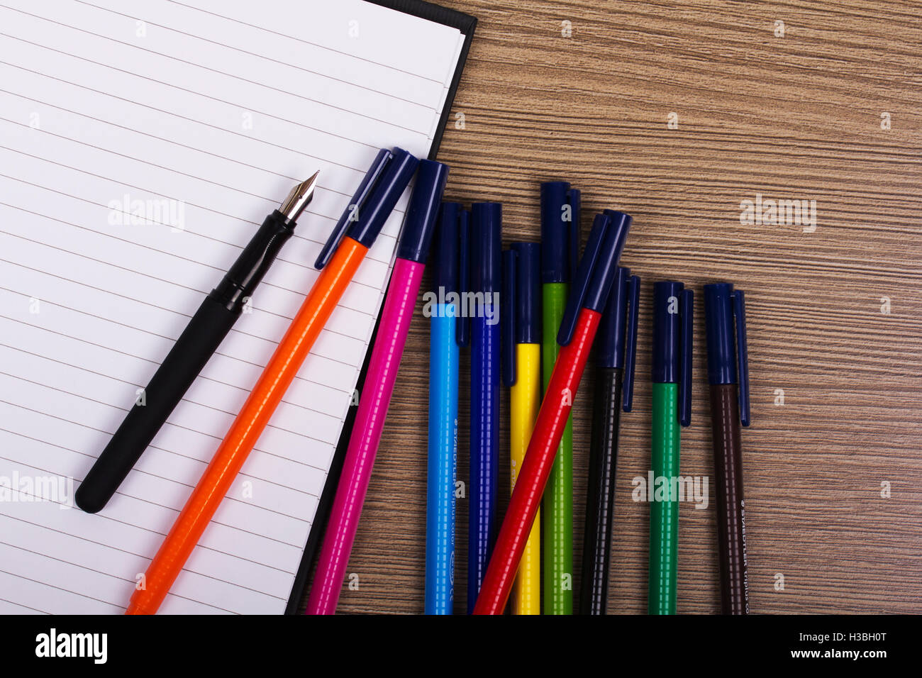 Notebook desk empty pens hi-res stock photography and images - Alamy