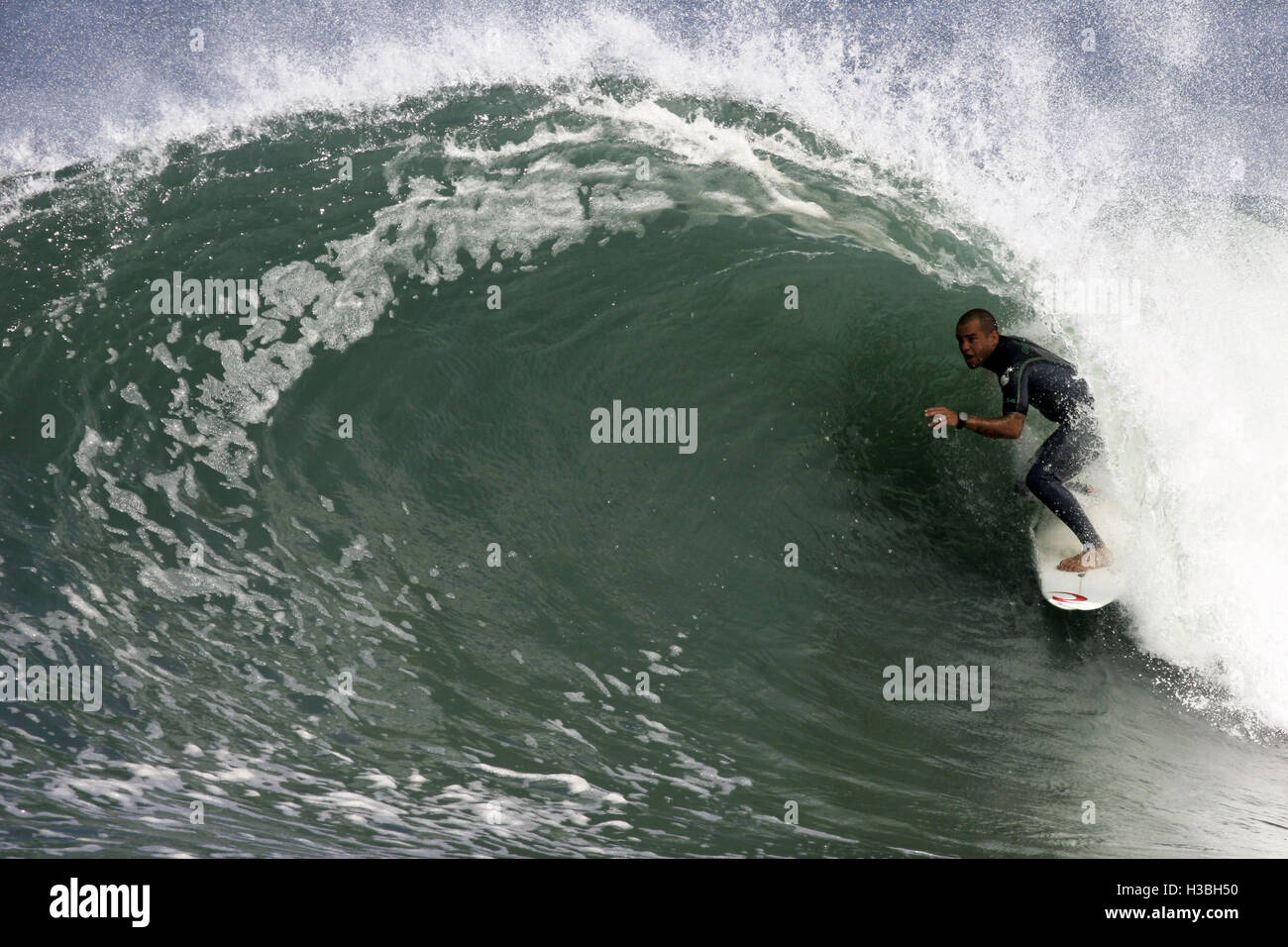 Tube riding a wave Stock Photo - Alamy
