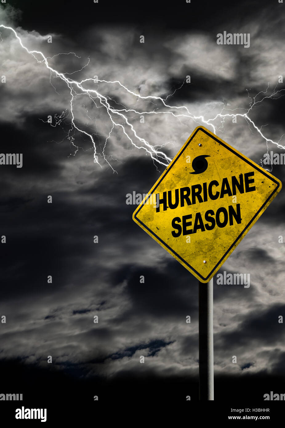 Hurricane season with symbol sign against a stormy background and copy ...
