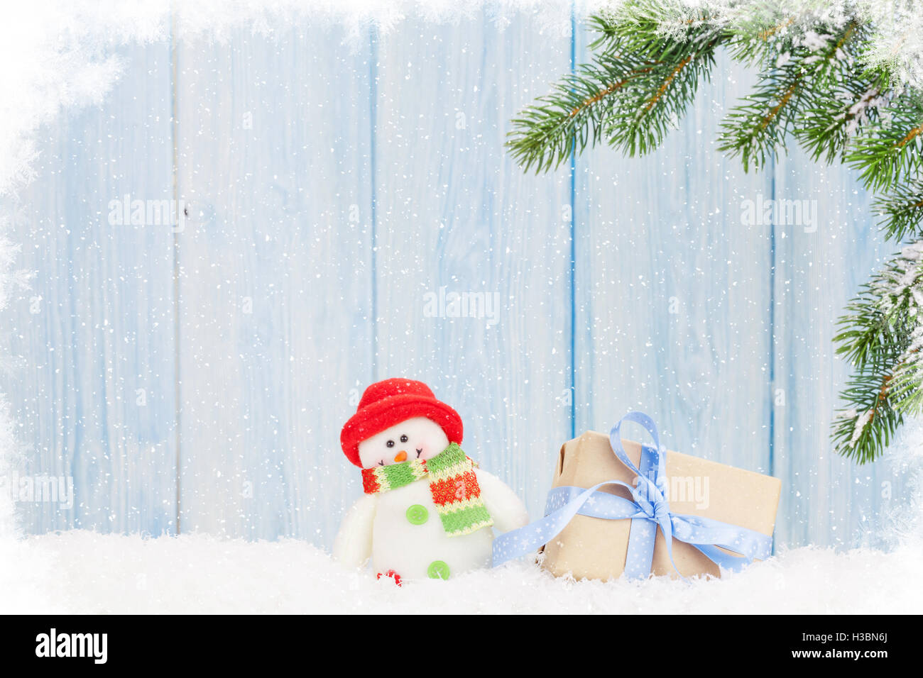 Snowman toy and fir tree branc hi-res stock photography and images - Alamy