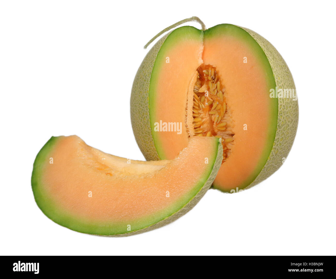 Orange muskmelon with stem and single slice piece cut off isolated on ...