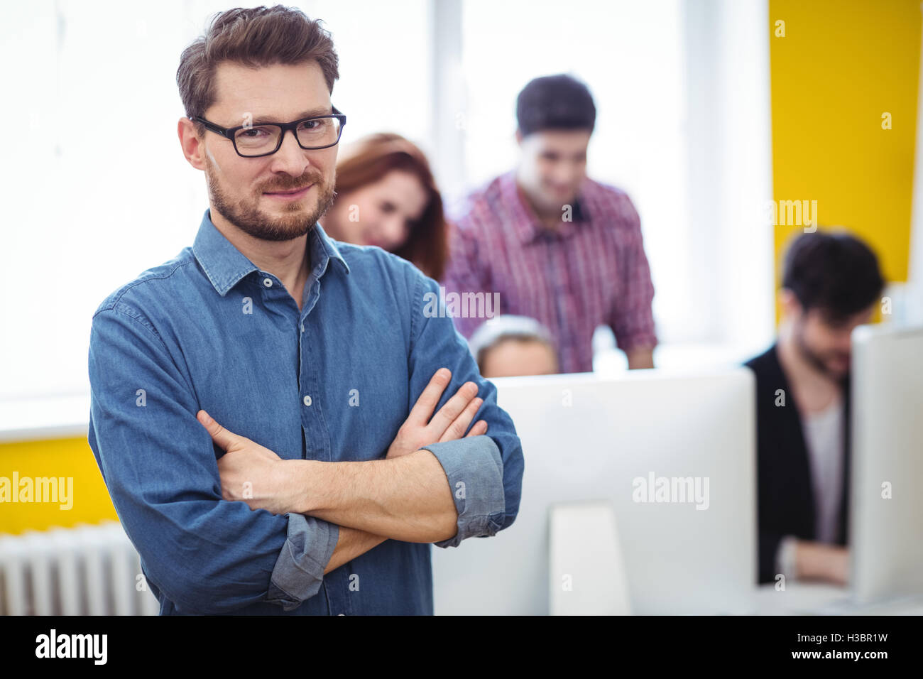 Coworkers crossed hi-res stock photography and images - Alamy